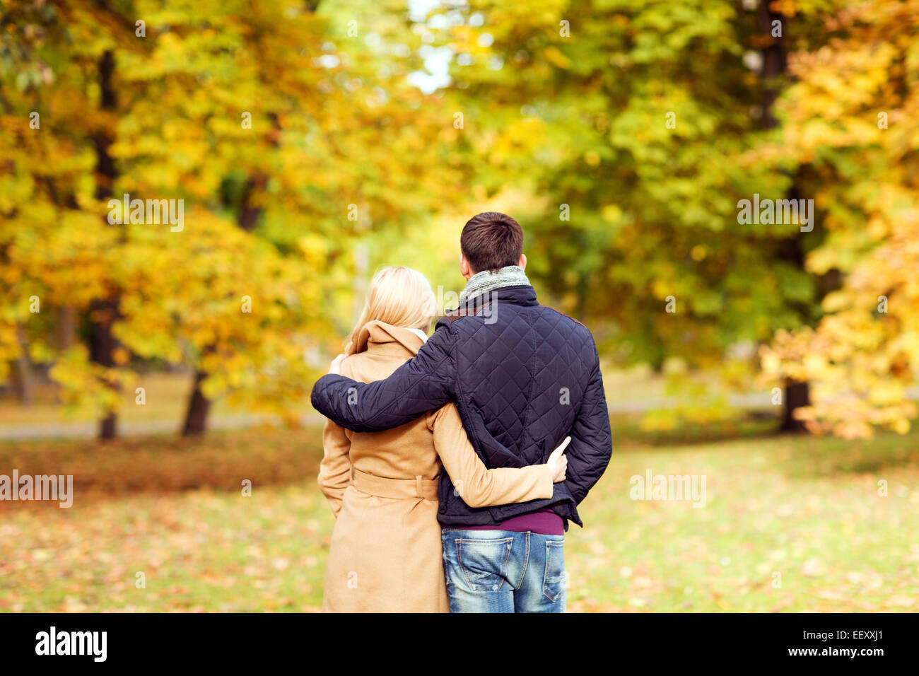 Woman hugging back view hi-res stock photography and images - Alamy
