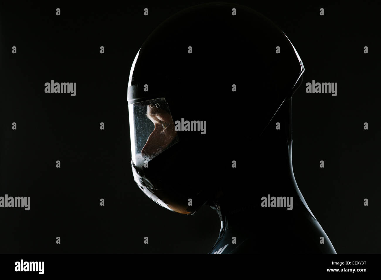 Profile of a male Bobsleigh Athlete with a helmet on Stock Photo - Alamy