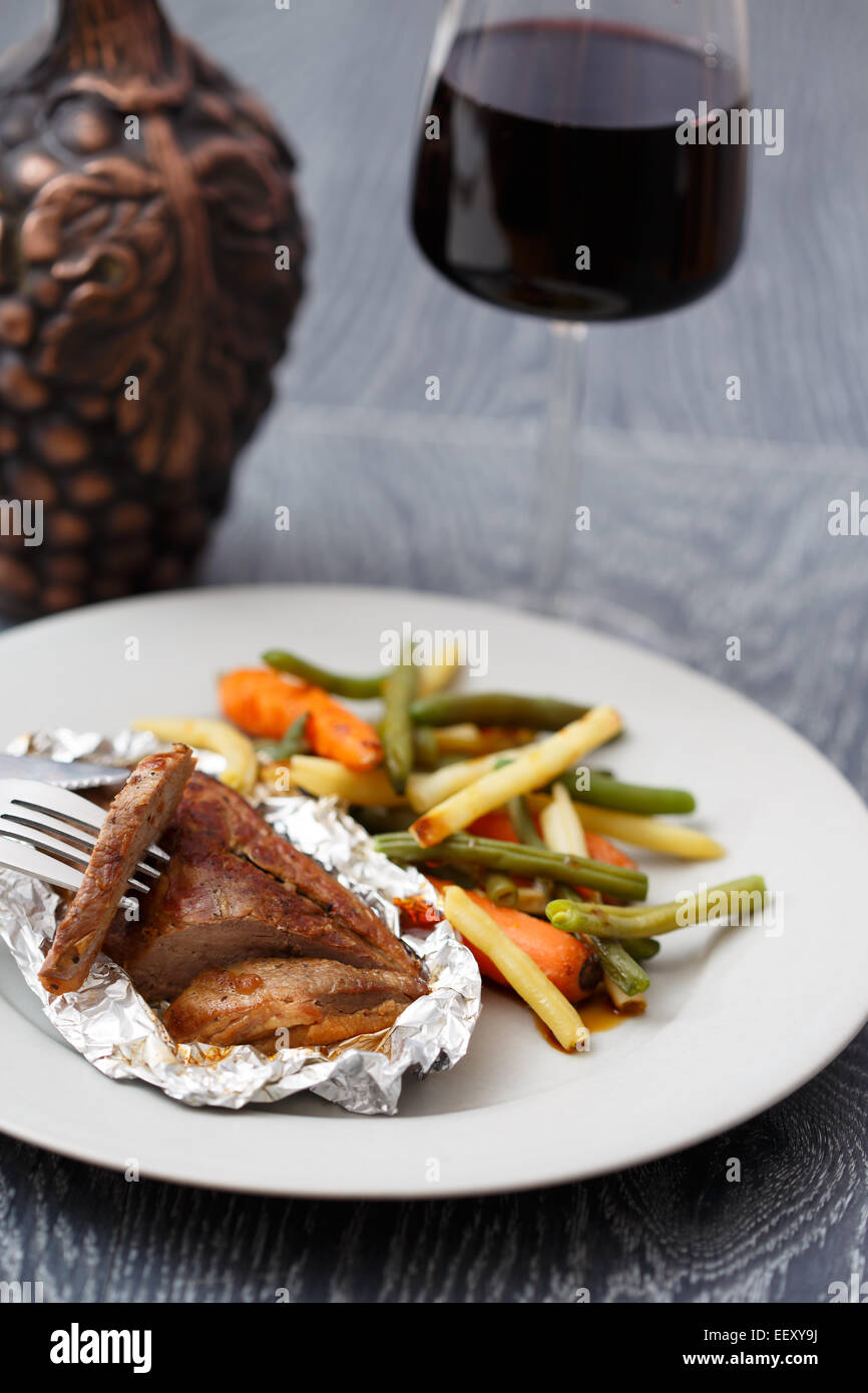 Cooked duck fillet served with vegetables Stock Photo - Alamy