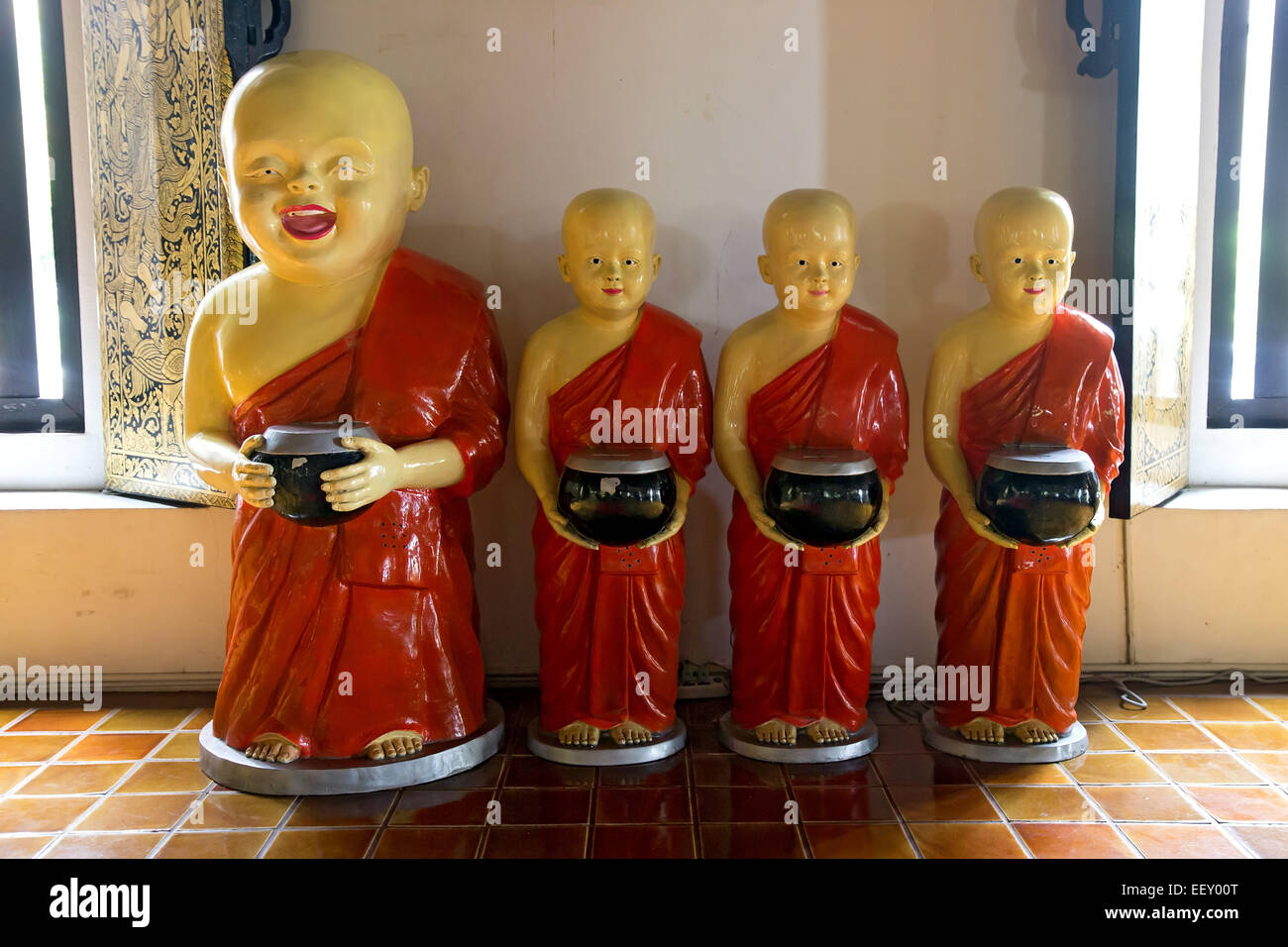 a group of statues of monks in a Buddhist monastery Stock Photo - Alamy