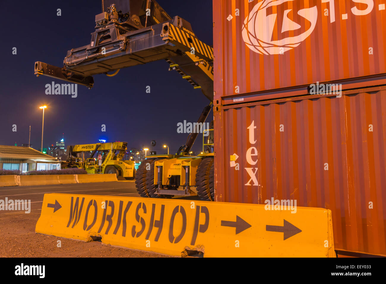 shipping containers on docks in yard stacked tractor for moving the ...