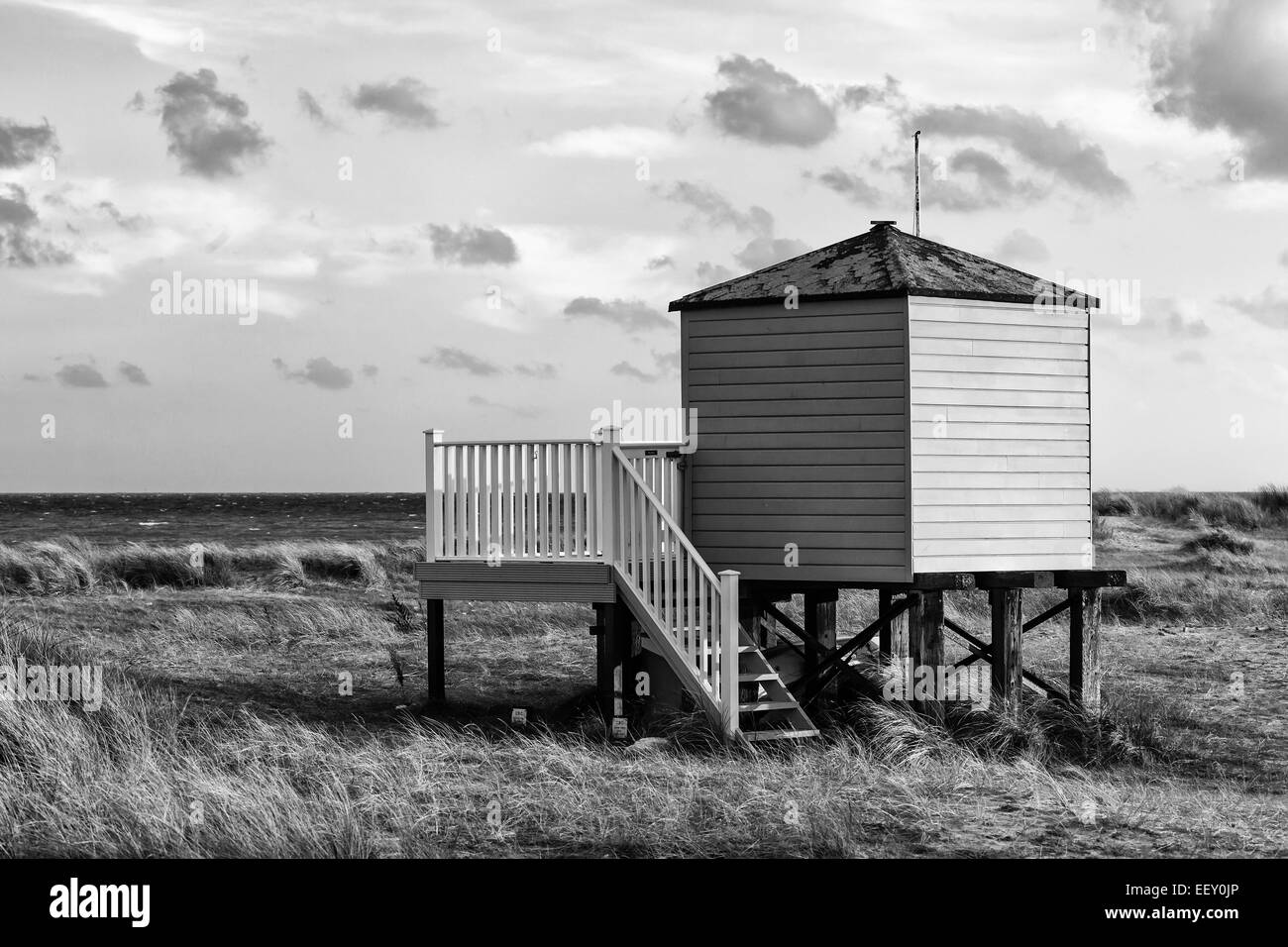 A beach hut on a grassy peninsula, Mudeford Spit, Christchurch Stock ...