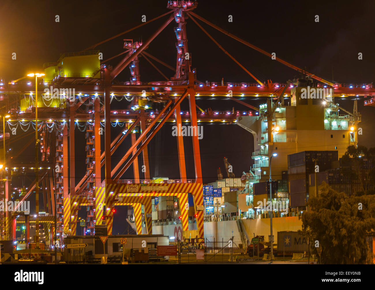 shipping containers on docks in yard stacked tractor for moving the ...