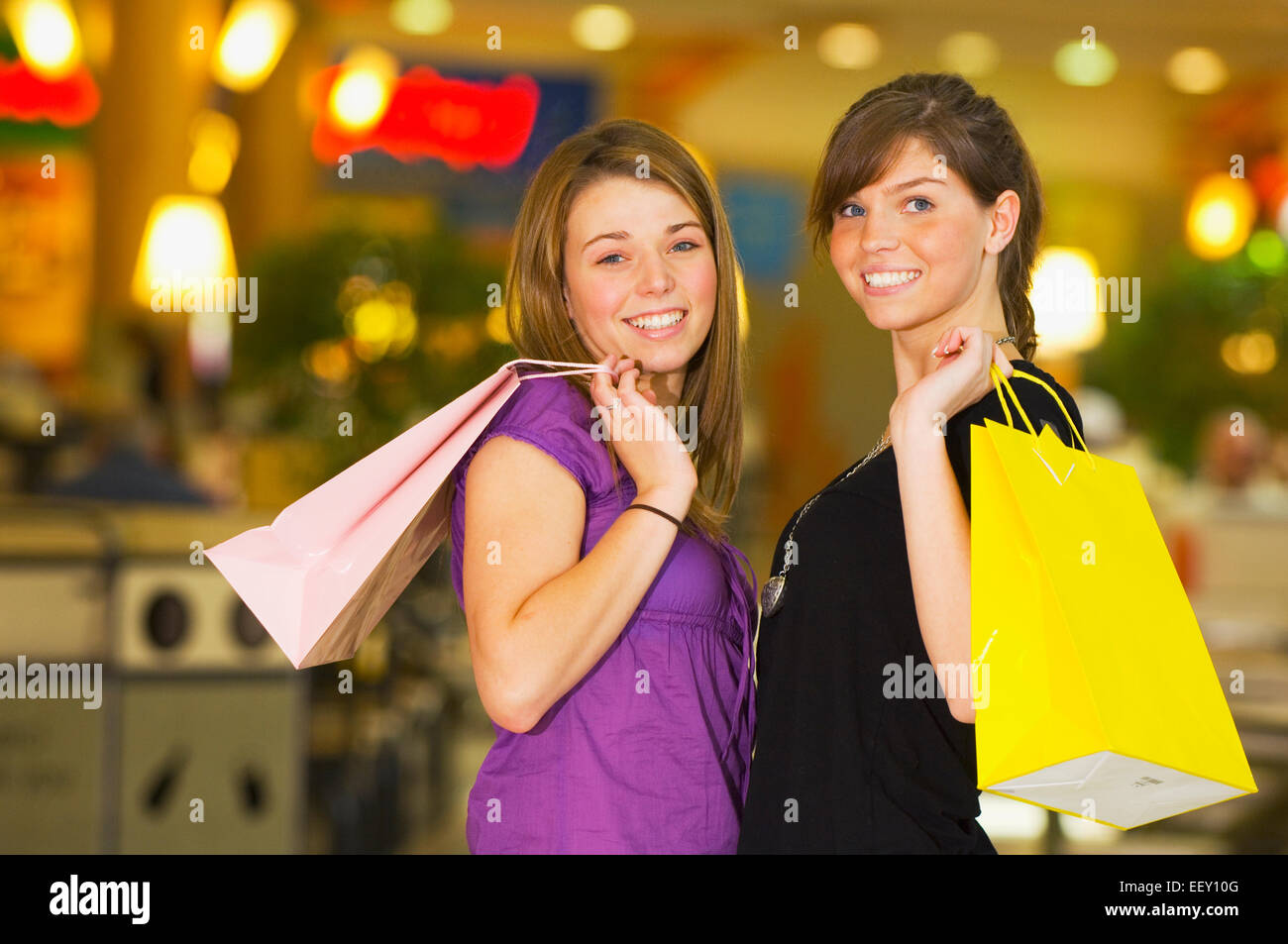 Two friends at a mall Stock Photo - Alamy