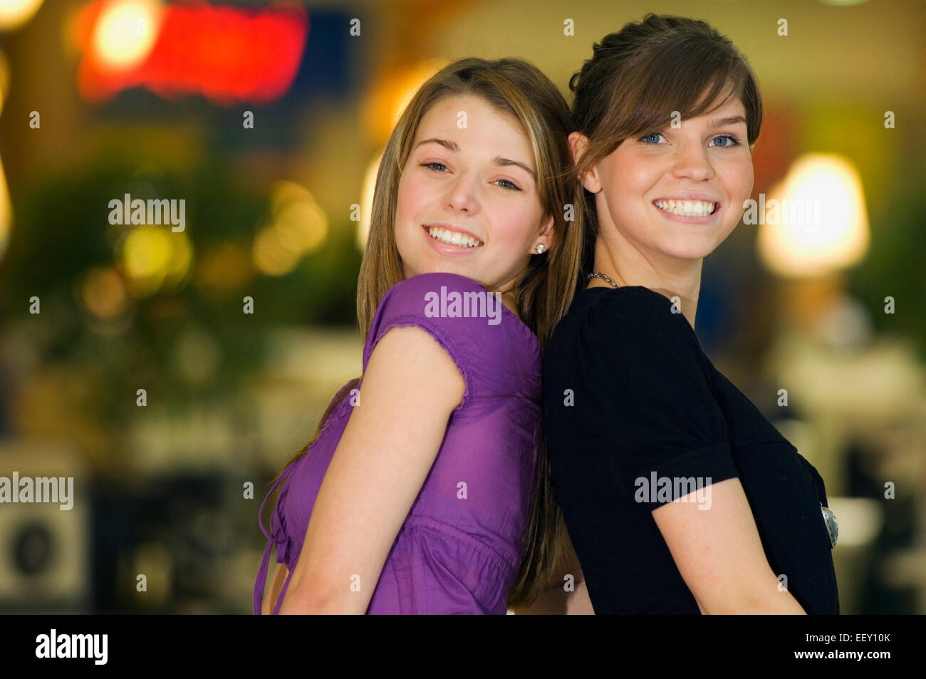 Two friends at a mall Stock Photo - Alamy