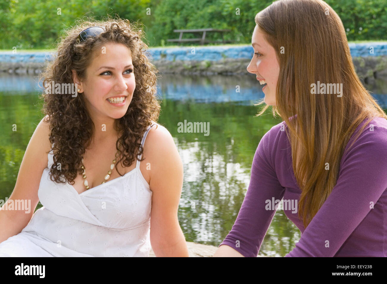 Two friends at a park Stock Photo - Alamy