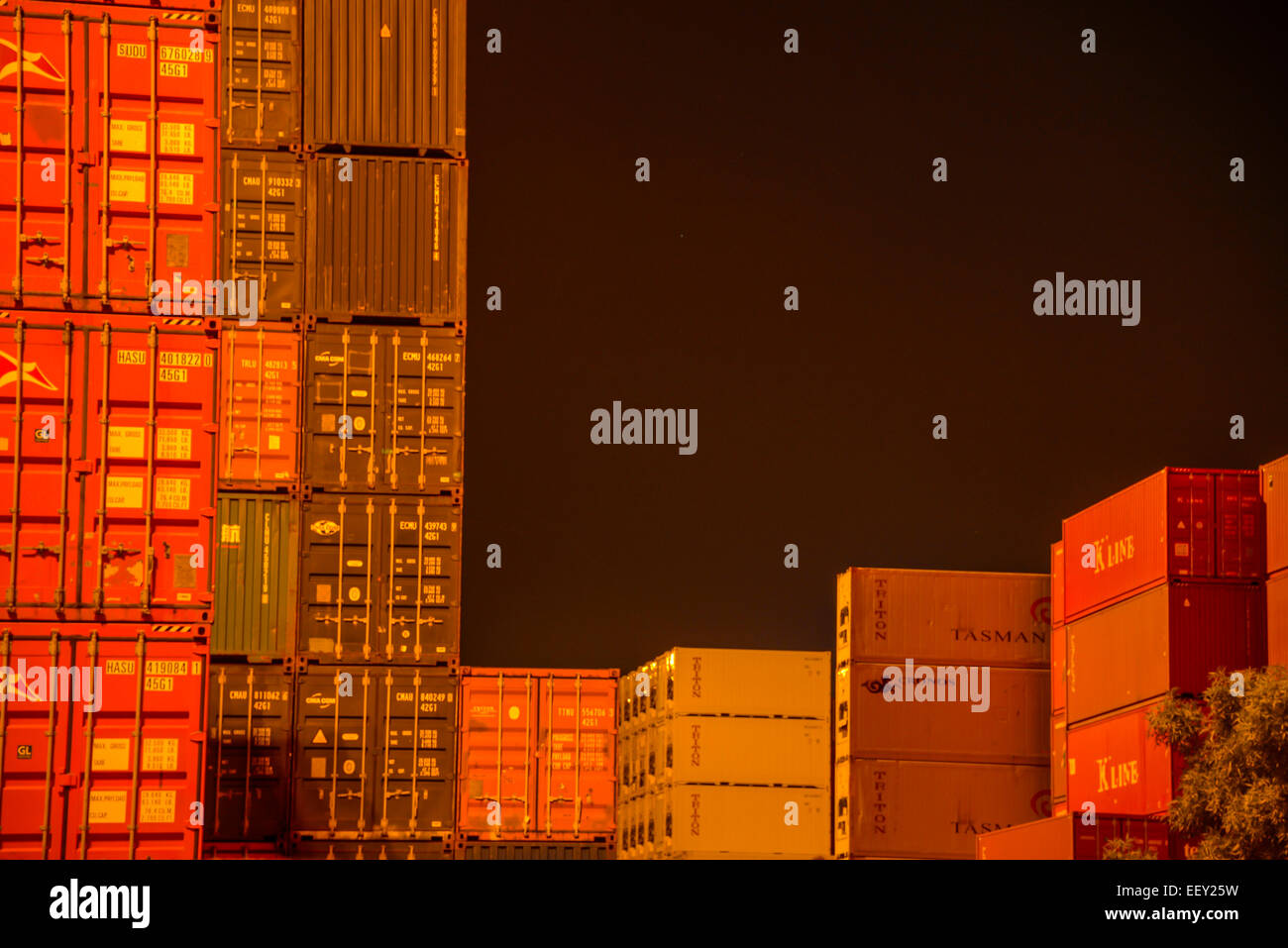 shipping containers on docks in yard stacked tractor for moving the ...