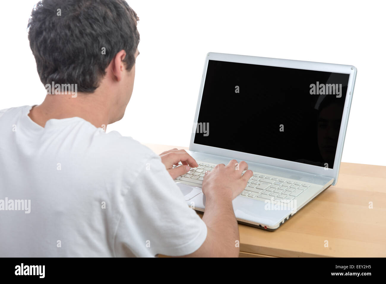 young man working with his laptop on the white background Stock Photo ...