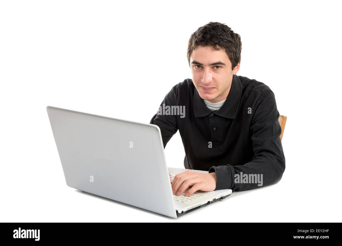 young man working with his laptop on the white background Stock Photo ...