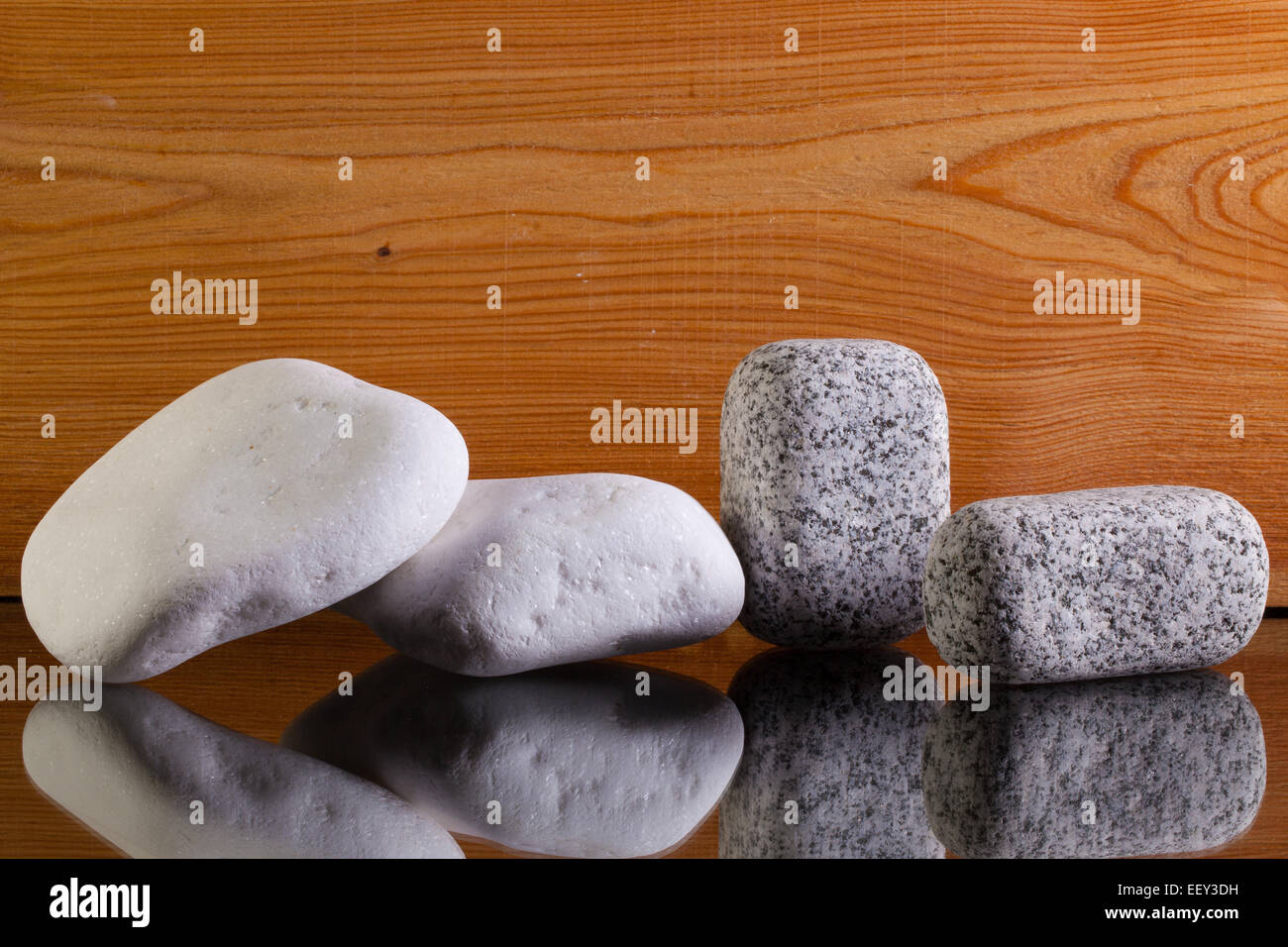 Different stones on a glass plate Stock Photo - Alamy