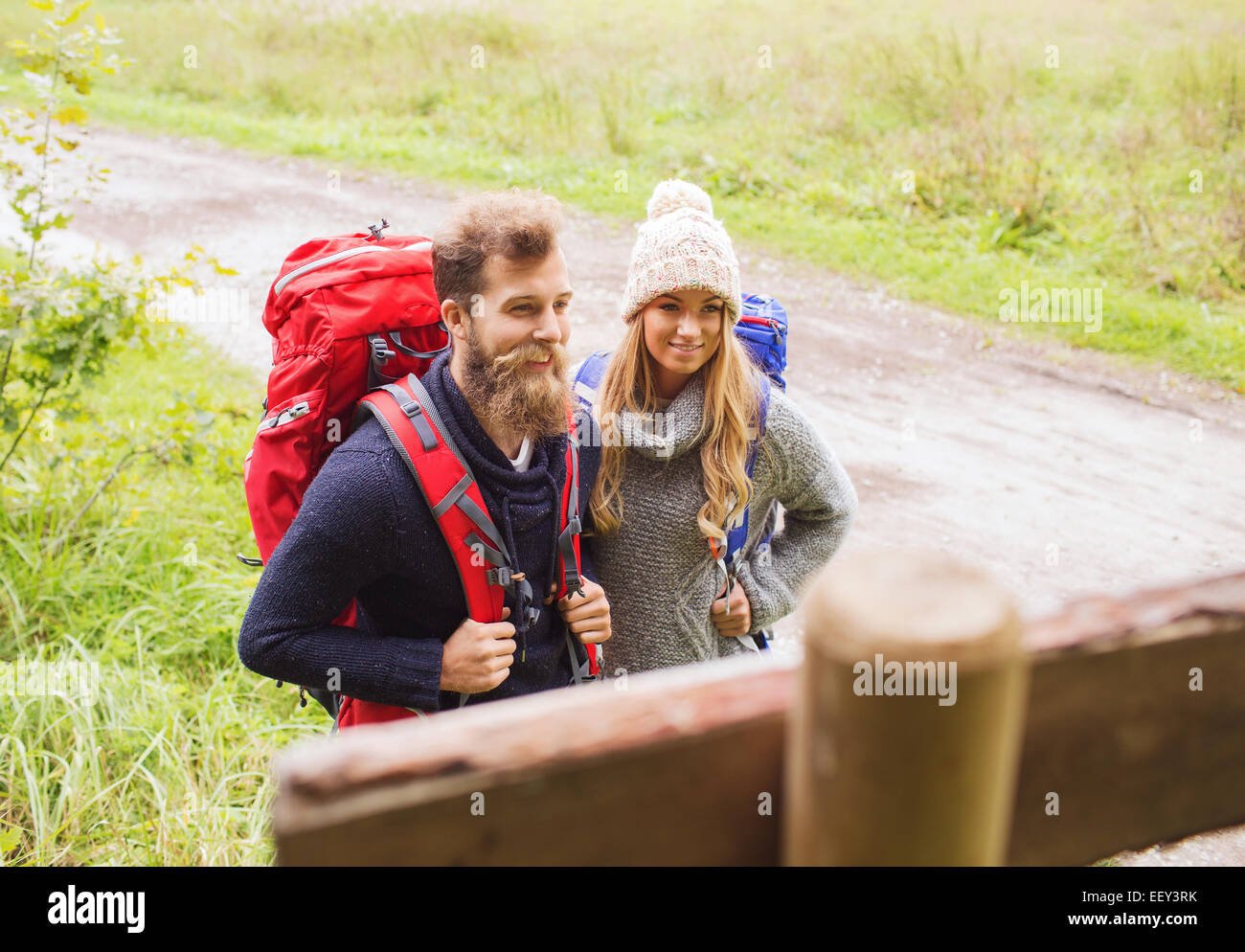 Teamwork travelers man woman backpacks hi-res stock photography and ...