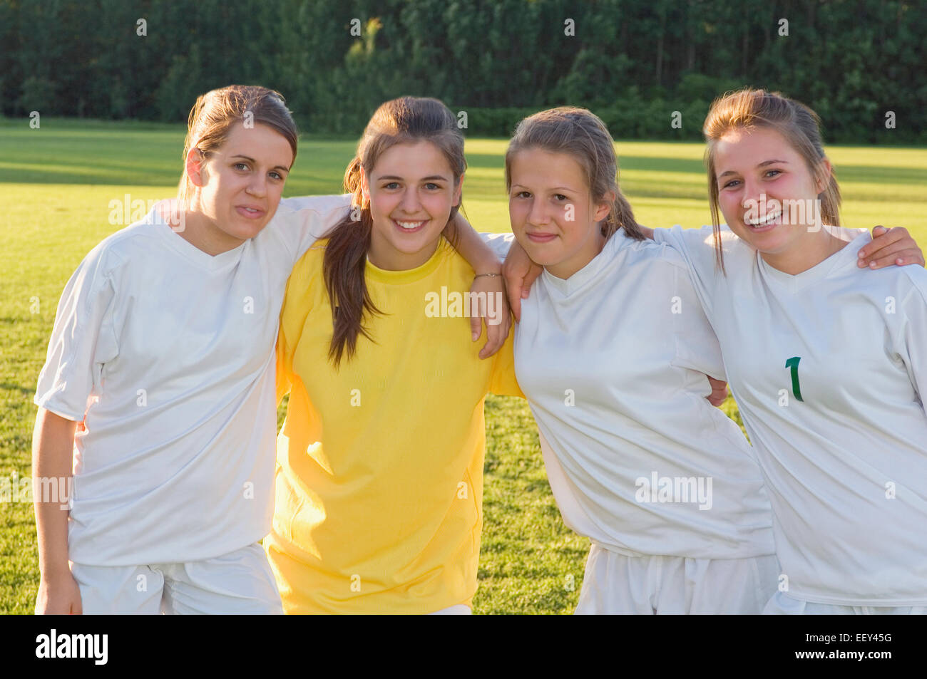 Girls on a soccer field Stock Photo - Alamy