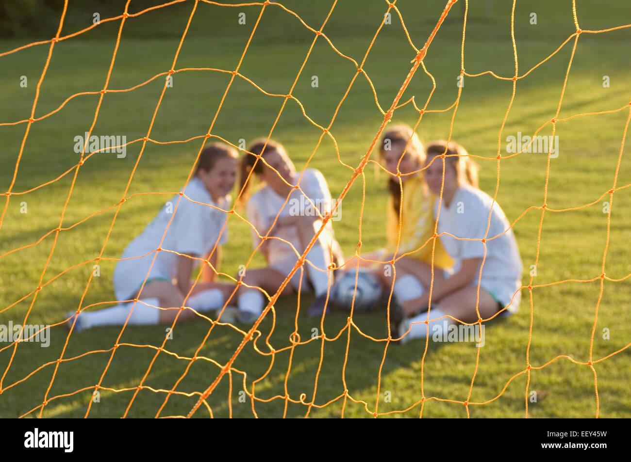 Girls on a soccer field Stock Photo - Alamy