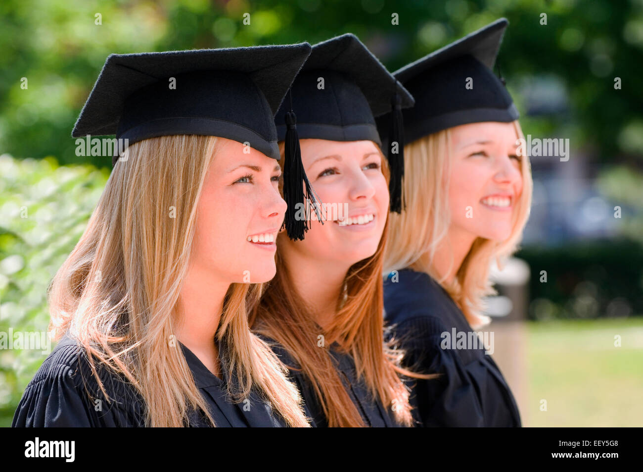 Three friends at graduation ceremony Stock Photo - Alamy