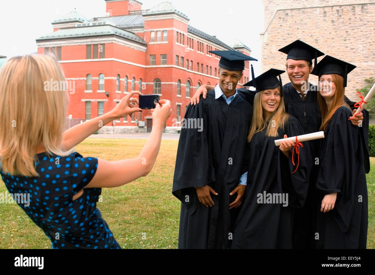 Five friends at graduation ceremony Stock Photo - Alamy