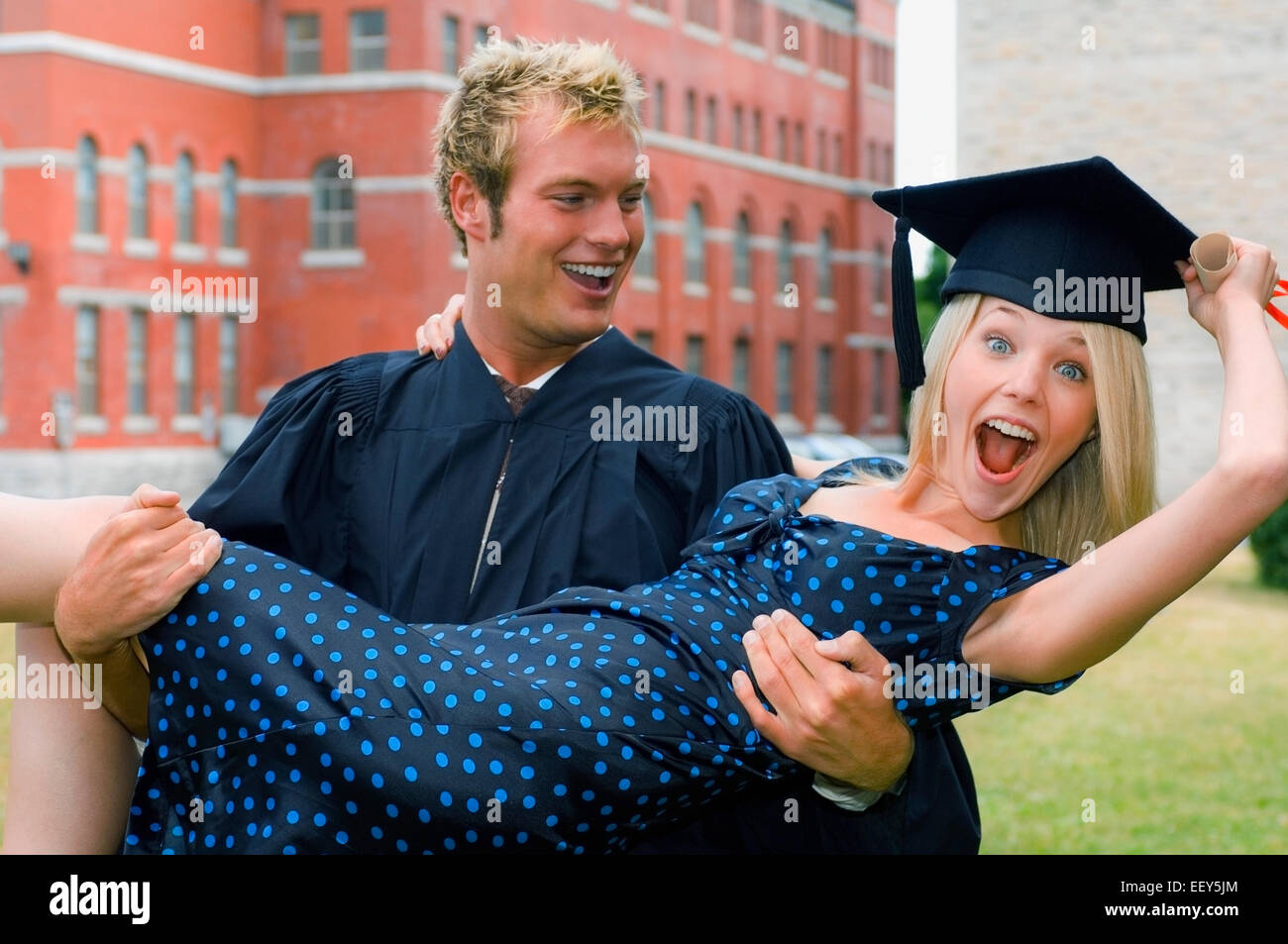 Young woman celebrating graduation outdoors hi-res stock photography ...