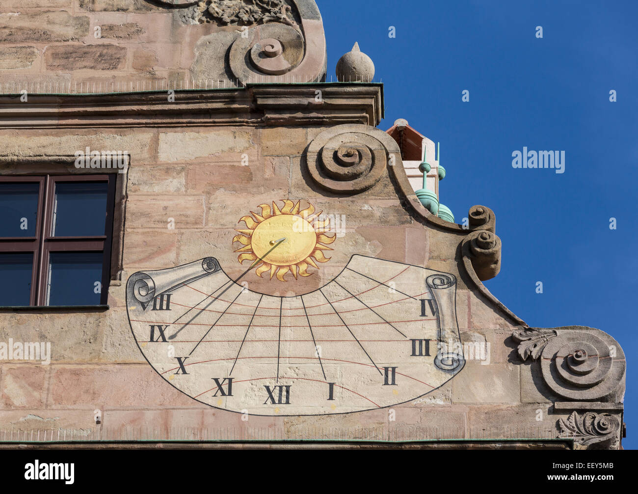 Old sundial on the side of Fembohaus Stadtmuseum in Nuremberg, Germany ...