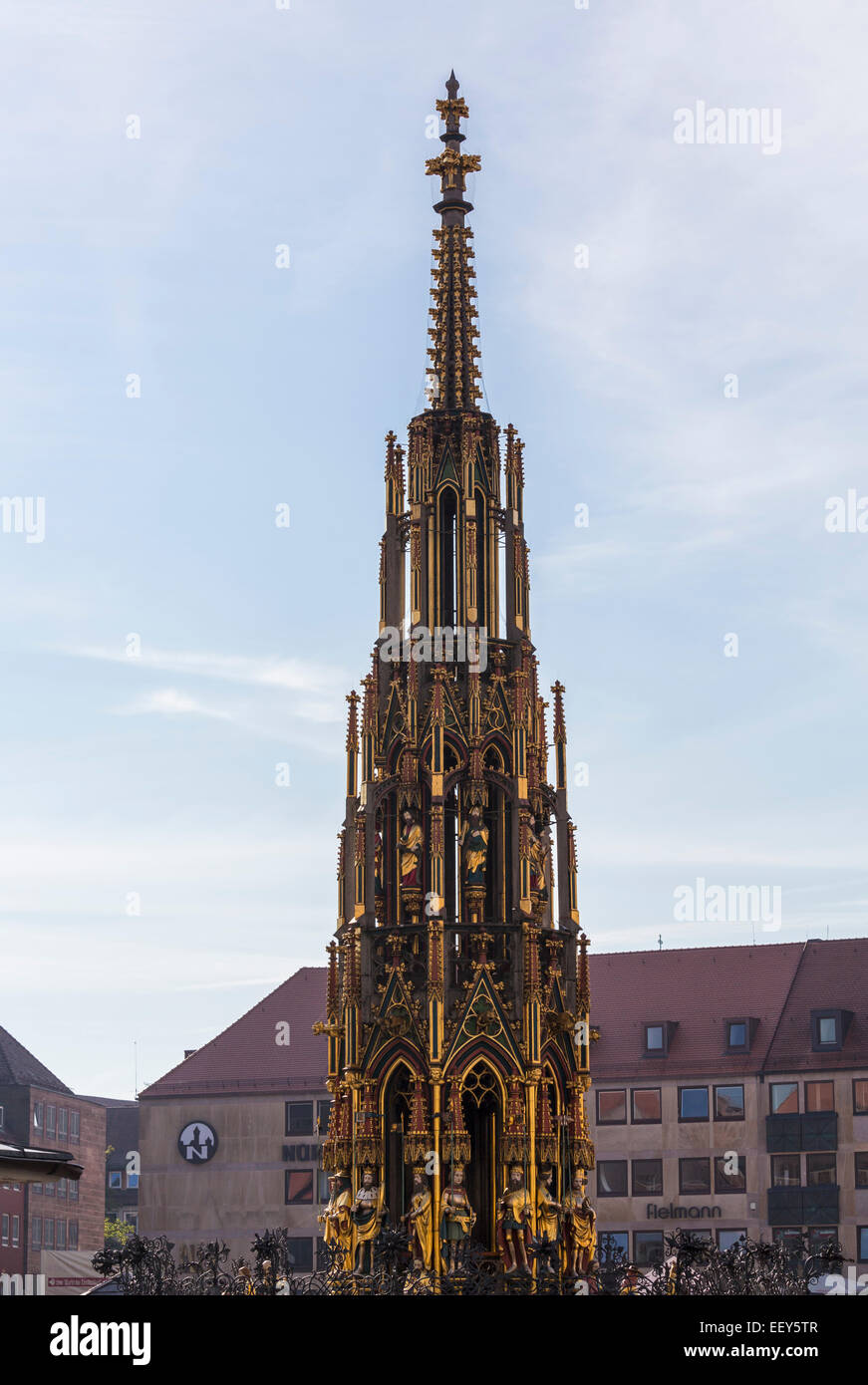 The Schoner Brunnen fountain and statue in market square of Nuremberg ...