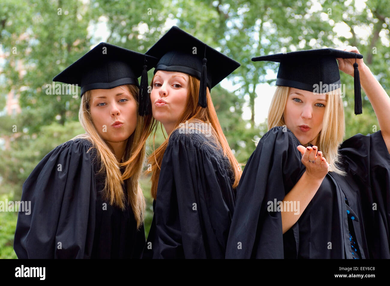 Three friends at graduation ceremony Stock Photo - Alamy