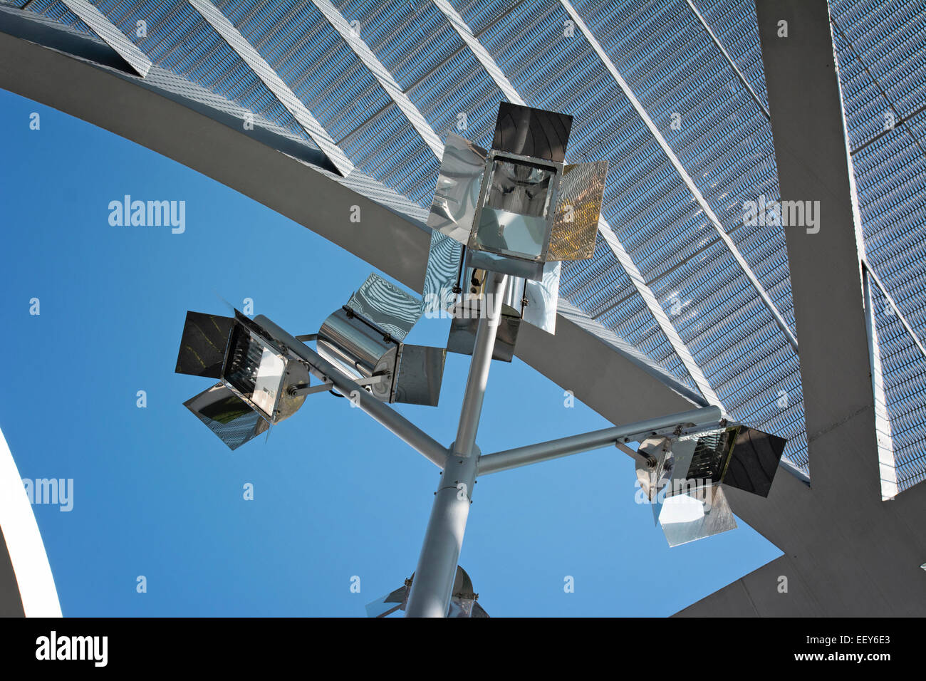 modern street lamp on metal mesh, horizontal image Stock Photo - Alamy