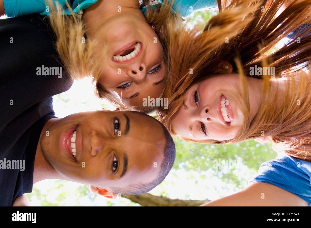 Three friends outdoors together Stock Photo - Alamy