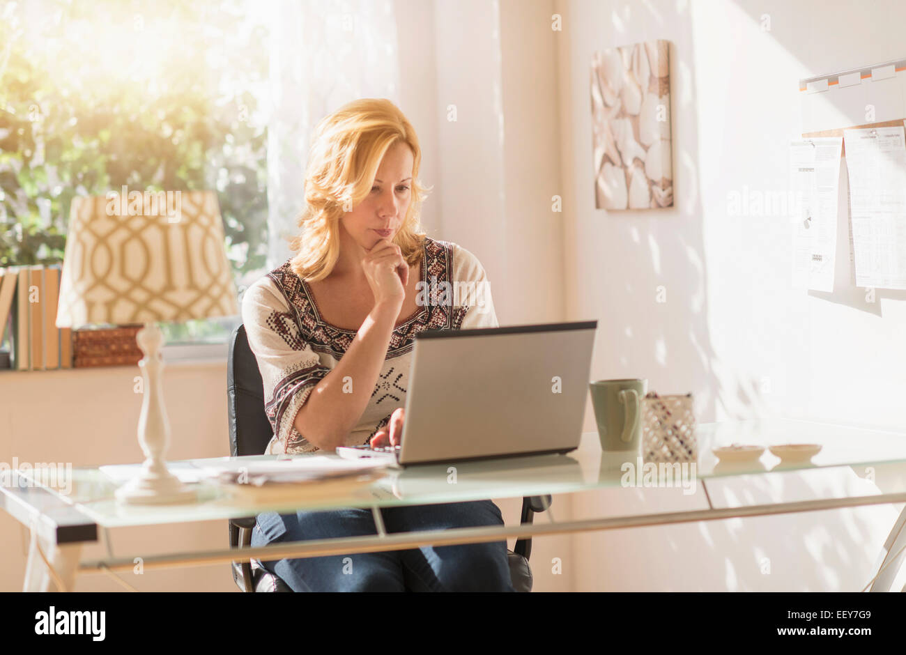 Woman 50 years desk at home pc hi-res stock photography and images - Alamy