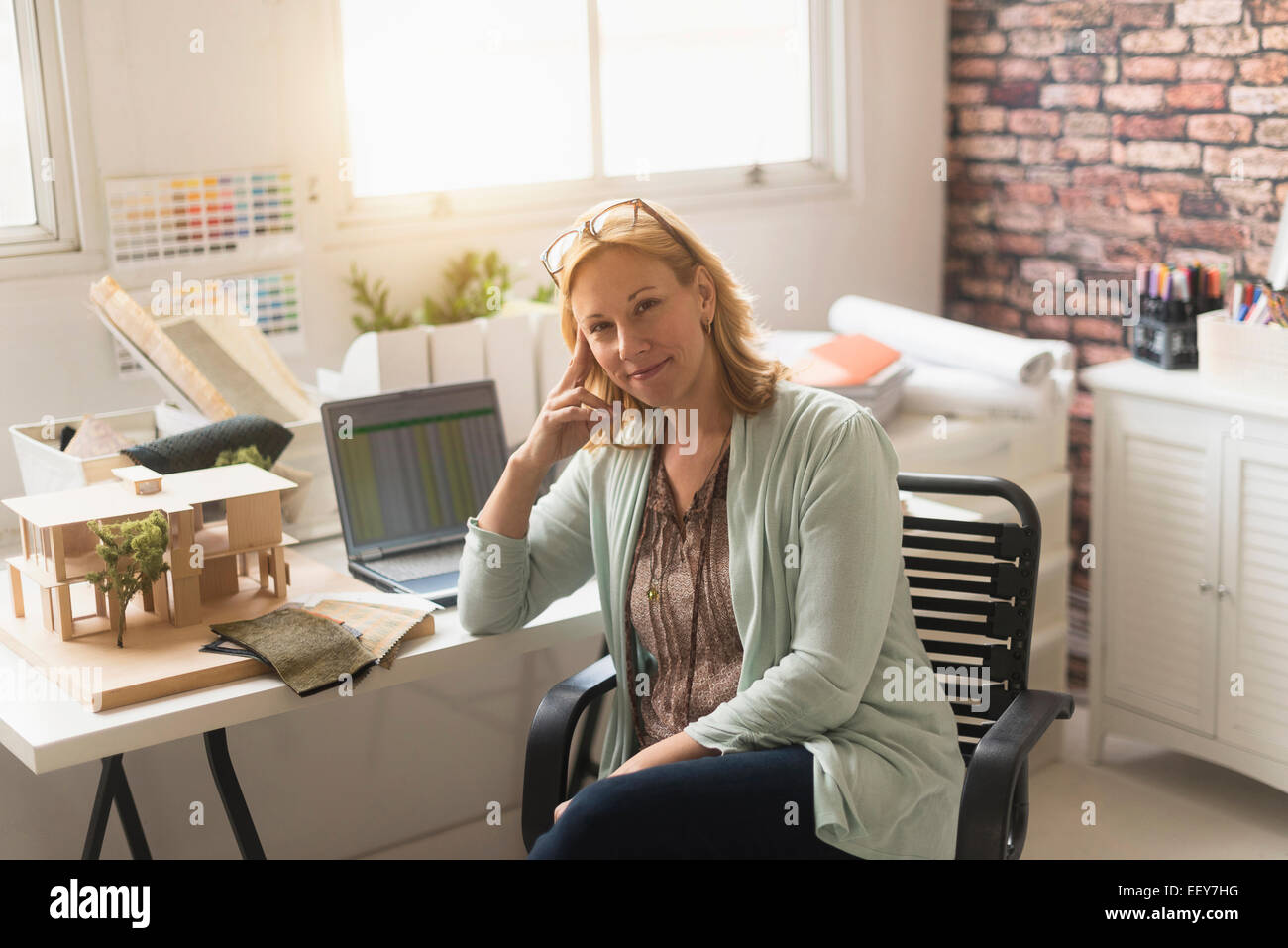 Female interior designer at work Stock Photo - Alamy