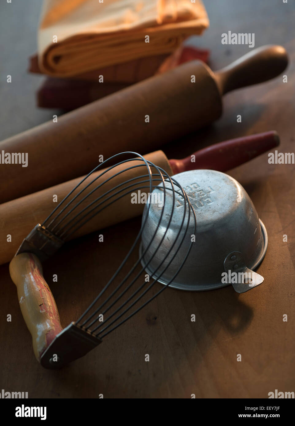 Old fashioned kitchen utensils on wood Stock Photo - Alamy