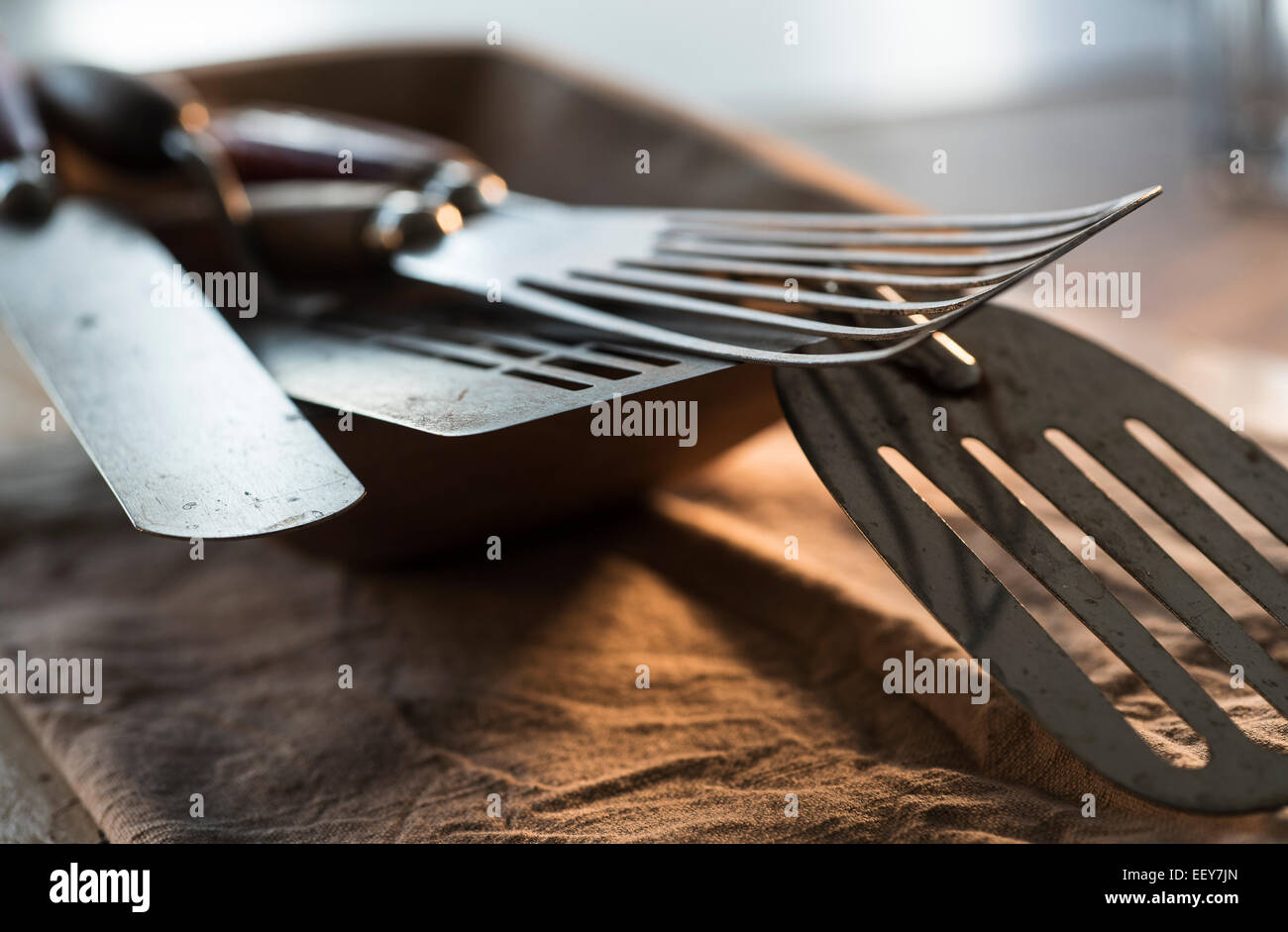 Close up of old kitchen utensils Stock Photo - Alamy