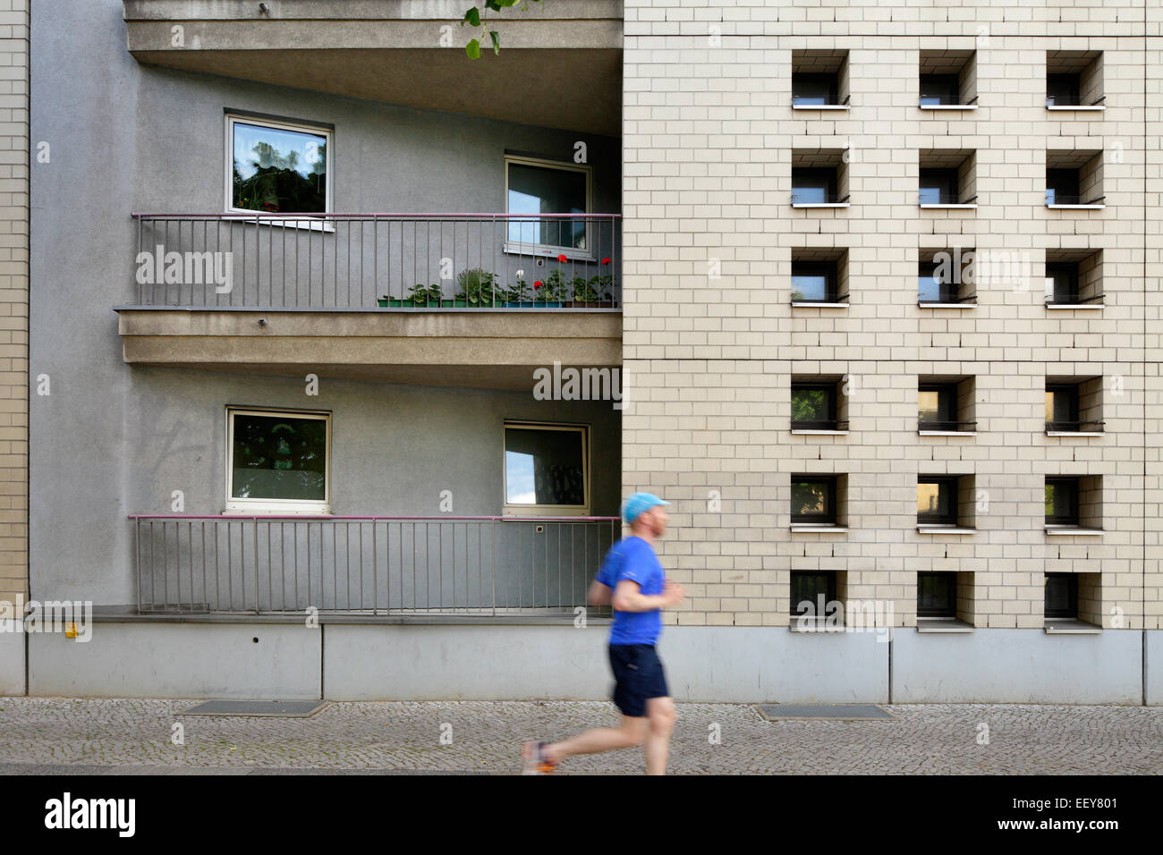 Berlin, Germany, facade with many small windows and balconies of an ...