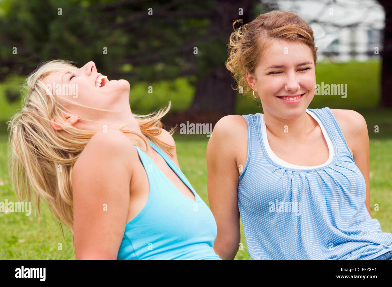 Two women at a park Stock Photo - Alamy