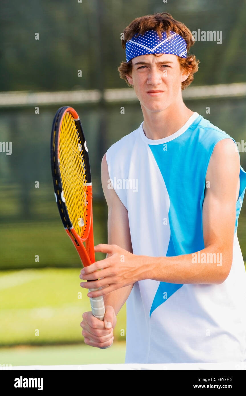 Tennis player alone on a court Stock Photo - Alamy
