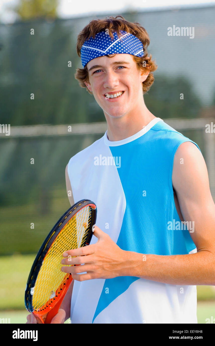 Tennis player alone on a court Stock Photo - Alamy