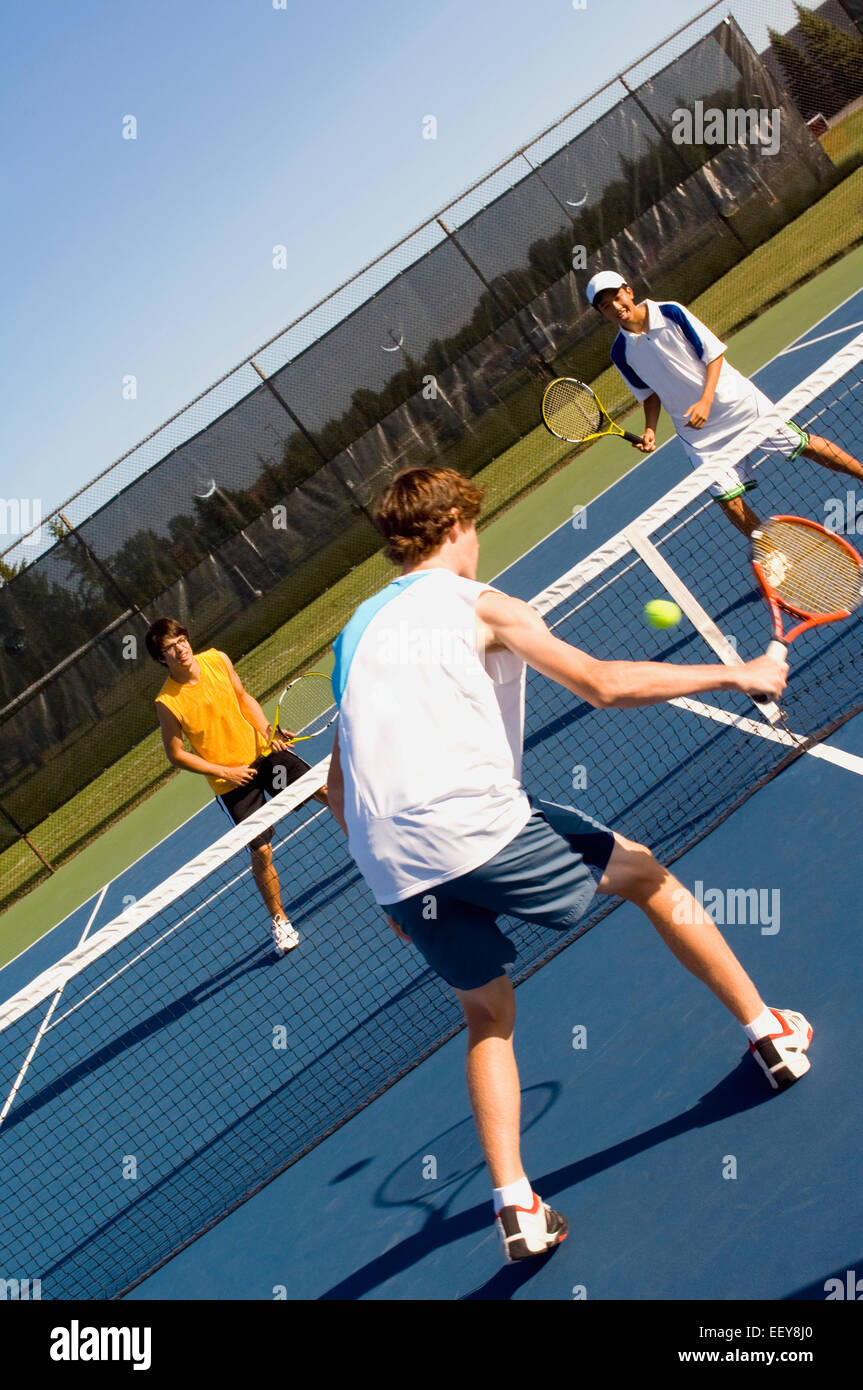 Group of tennis players on a court Stock Photo - Alamy