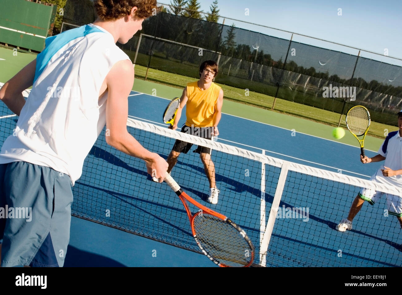 Group of tennis players on a court Stock Photo - Alamy