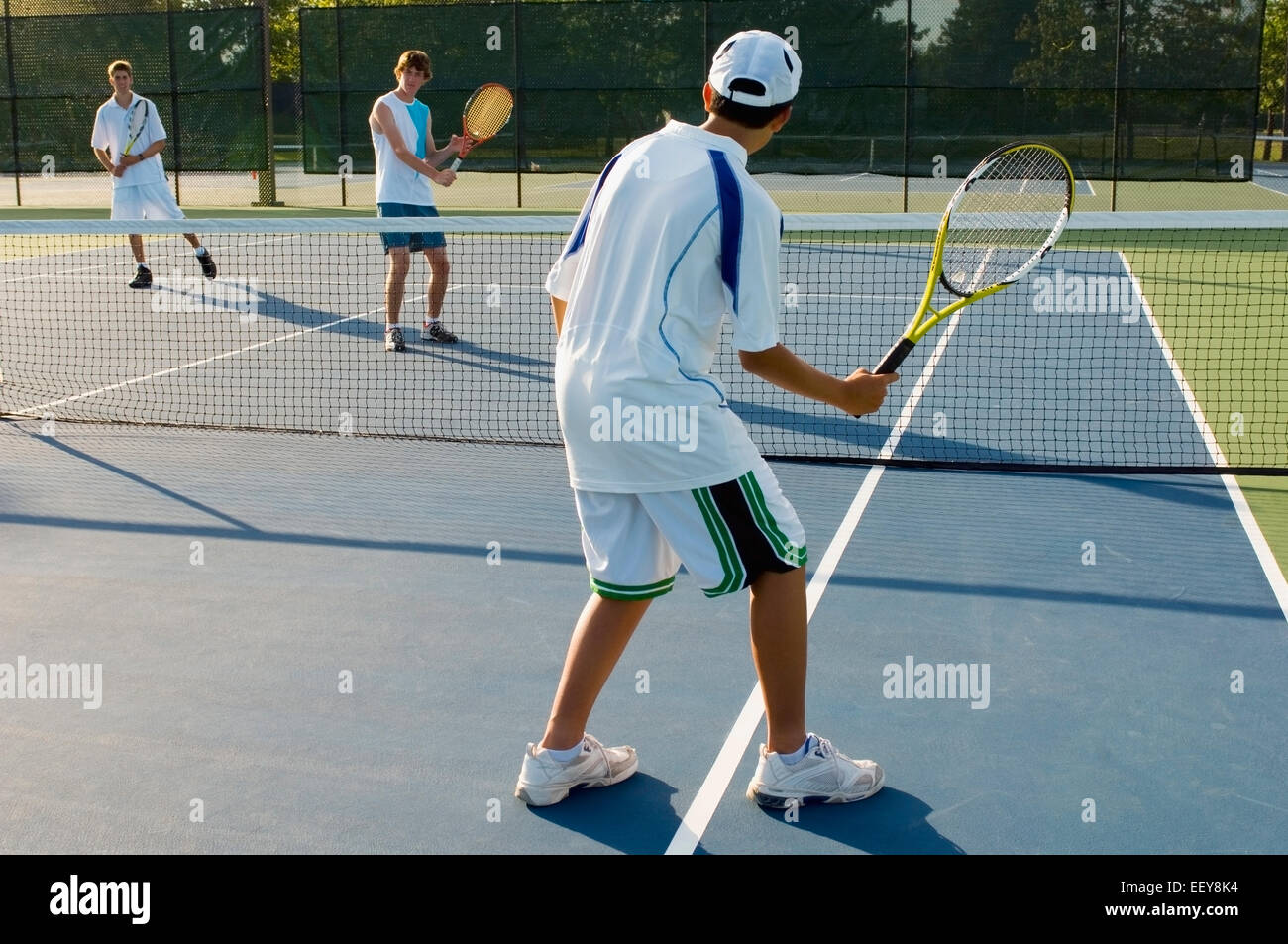 Group of tennis players on a court Stock Photo - Alamy