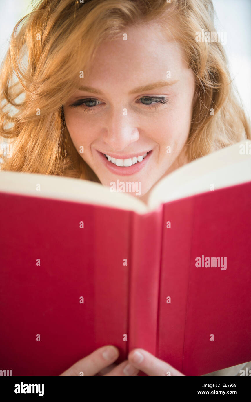 Young woman reading book Stock Photo - Alamy Young woman reading book Stock Photo - Alamy