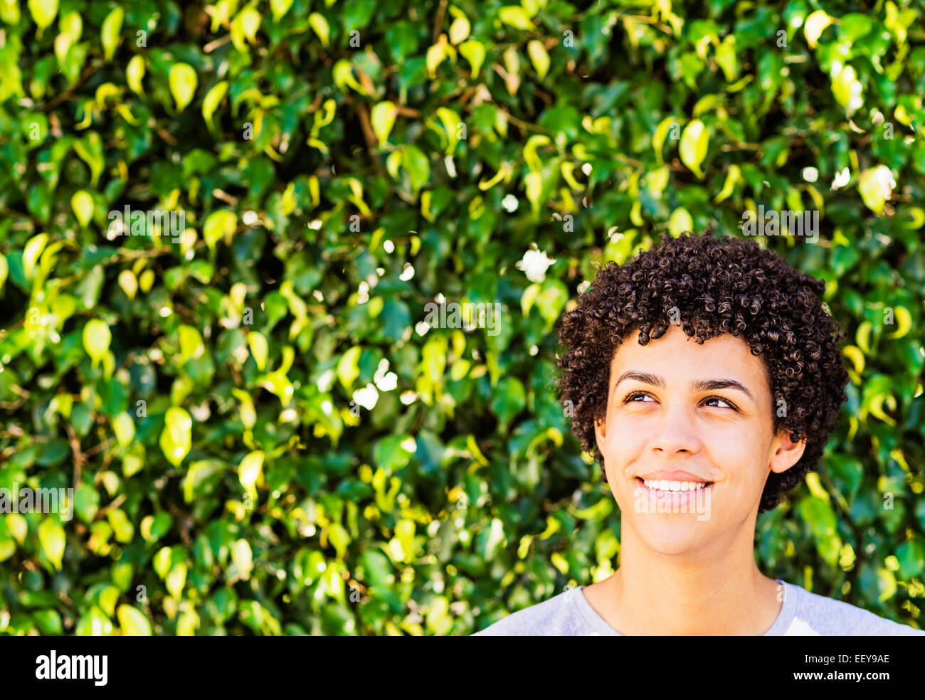 Portrait of smiling young man Stock Photo - Alamy