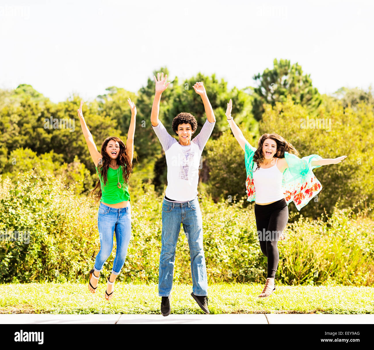 Teen girl jumping in air hi-res stock photography and images - Alamy