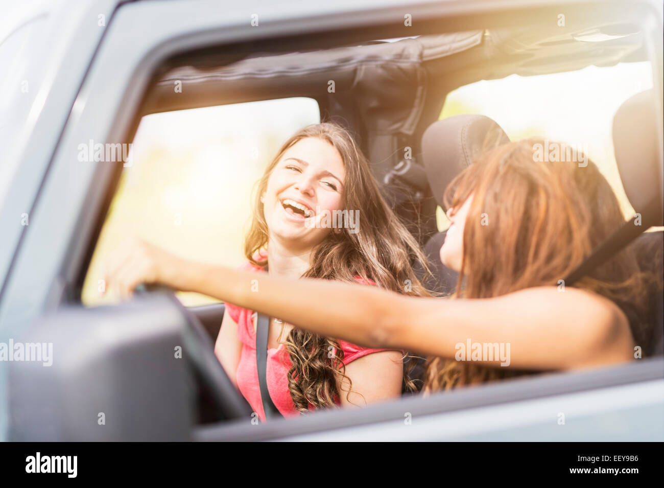 Female friends (14-15) during road trip Stock Photo - Alamy