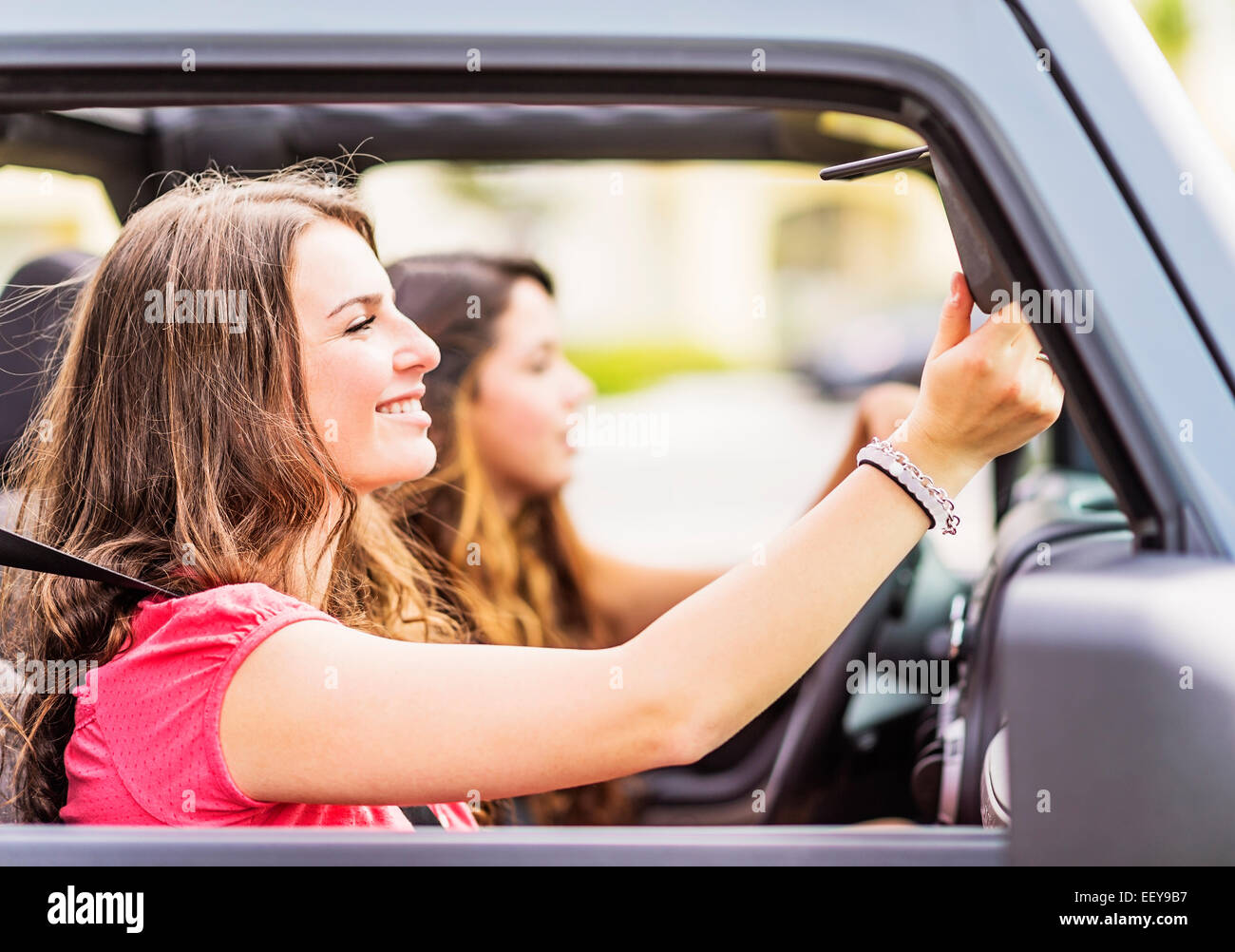 Female friends (14-15) during road trip Stock Photo - Alamy