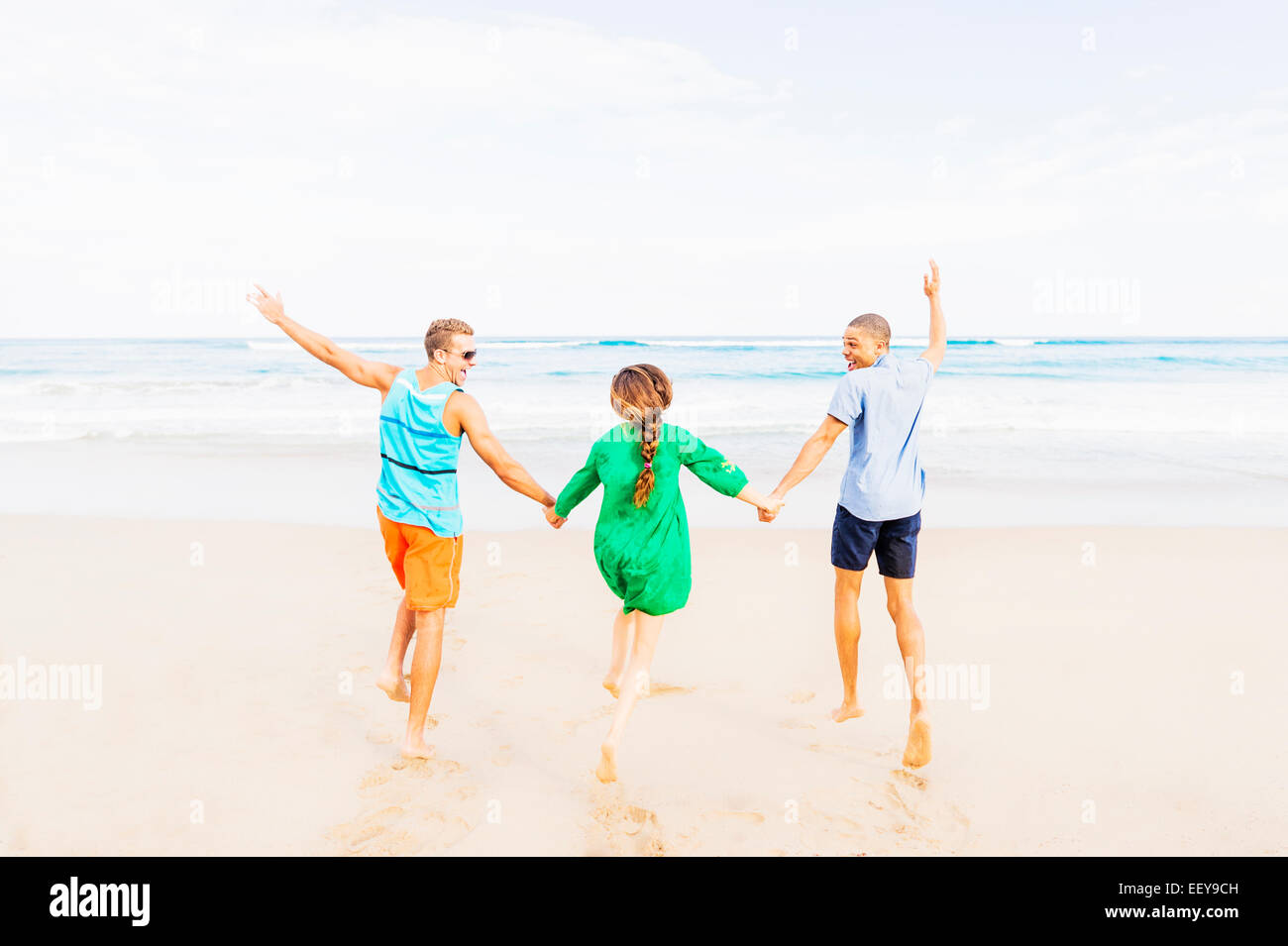 Running holding hands hi-res stock photography and images - Alamy