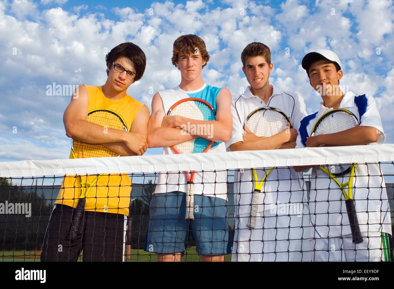 Group of tennis players on a court Stock Photo - Alamy