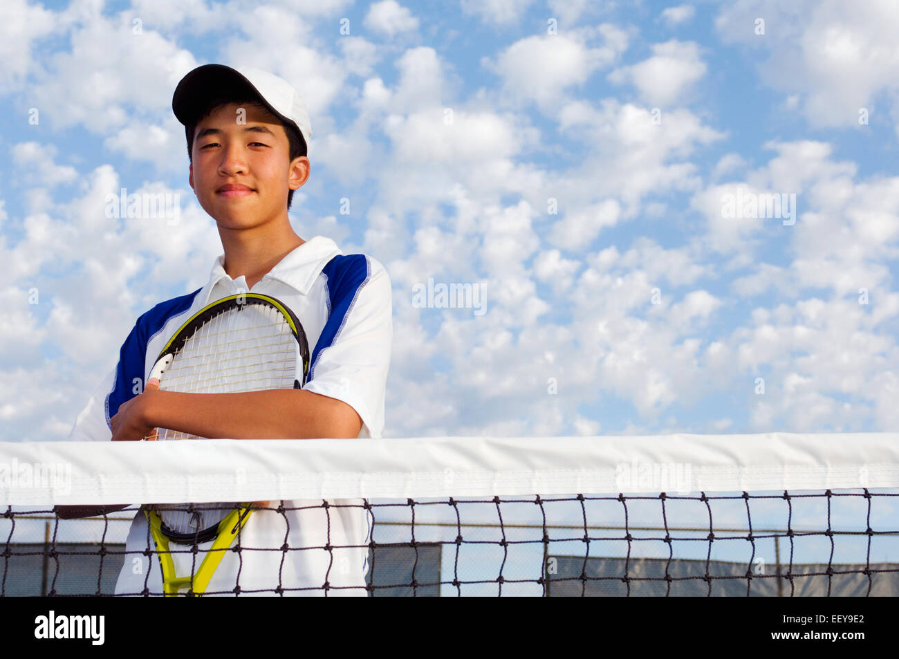Tennis player alone on a court Stock Photo - Alamy