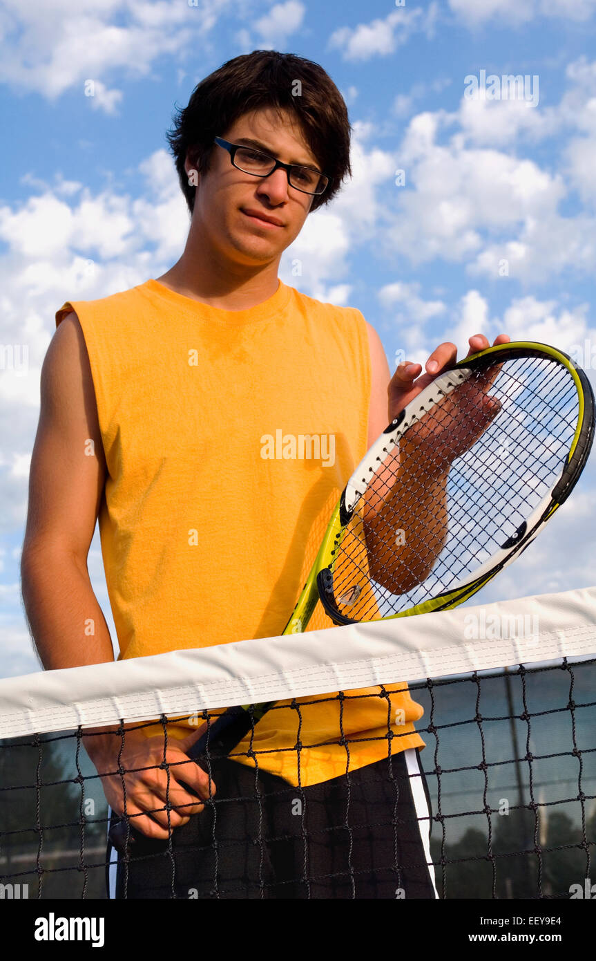 Tennis player alone on a court Stock Photo - Alamy