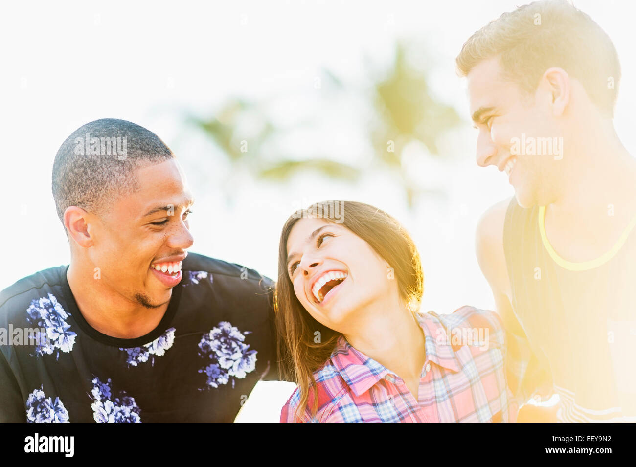 Portrait of young people laughing Stock Photo - Alamy