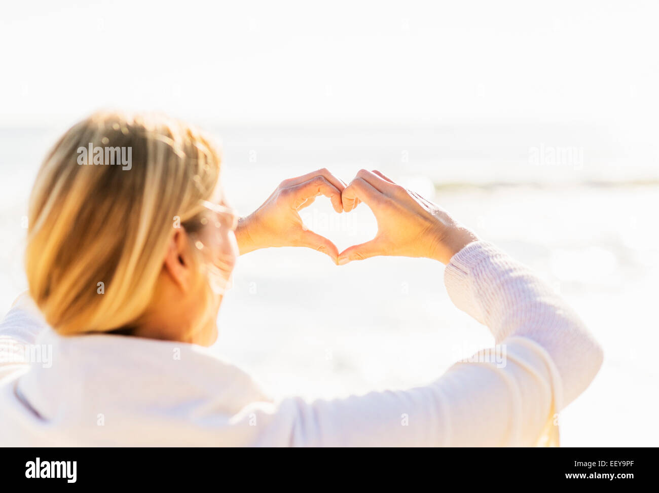 Woman hand over heart hi-res stock photography and images - Alamy