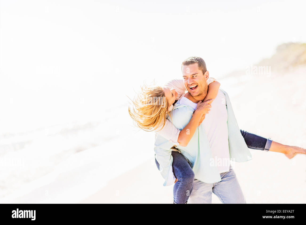 Piggy back ride woman and man hi-res stock photography and images - Alamy