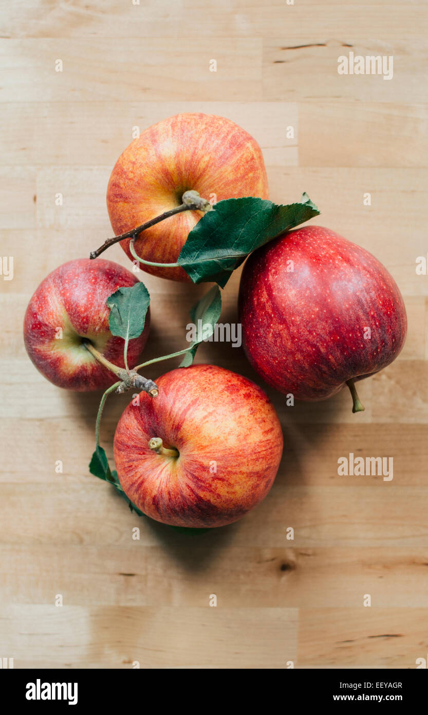 Four red apples Stock Photo - Alamy