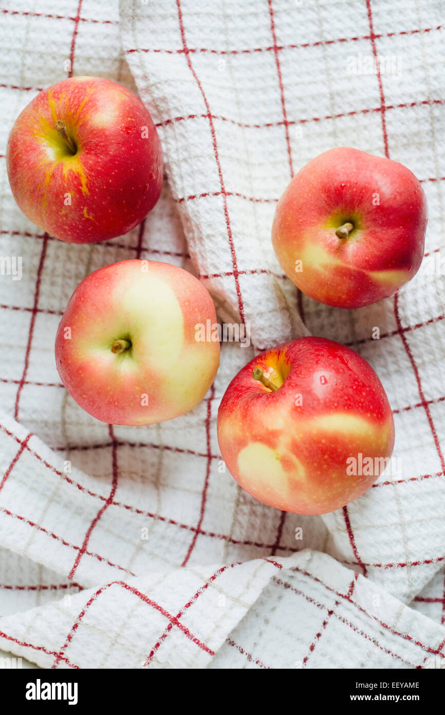 Four red apples Stock Photo - Alamy